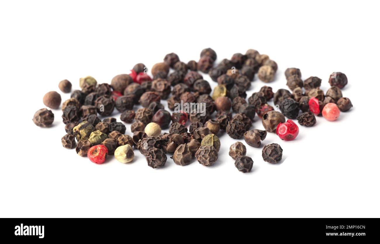 Mix of different pepper grains isolated on white Stock Photo - Alamy