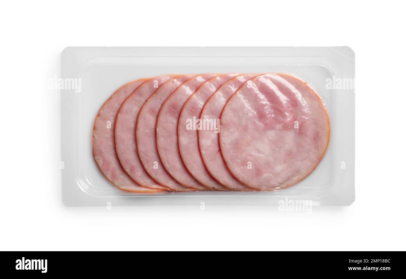 Tasty sliced ham in plastic pack isolated on white, top view Stock ...