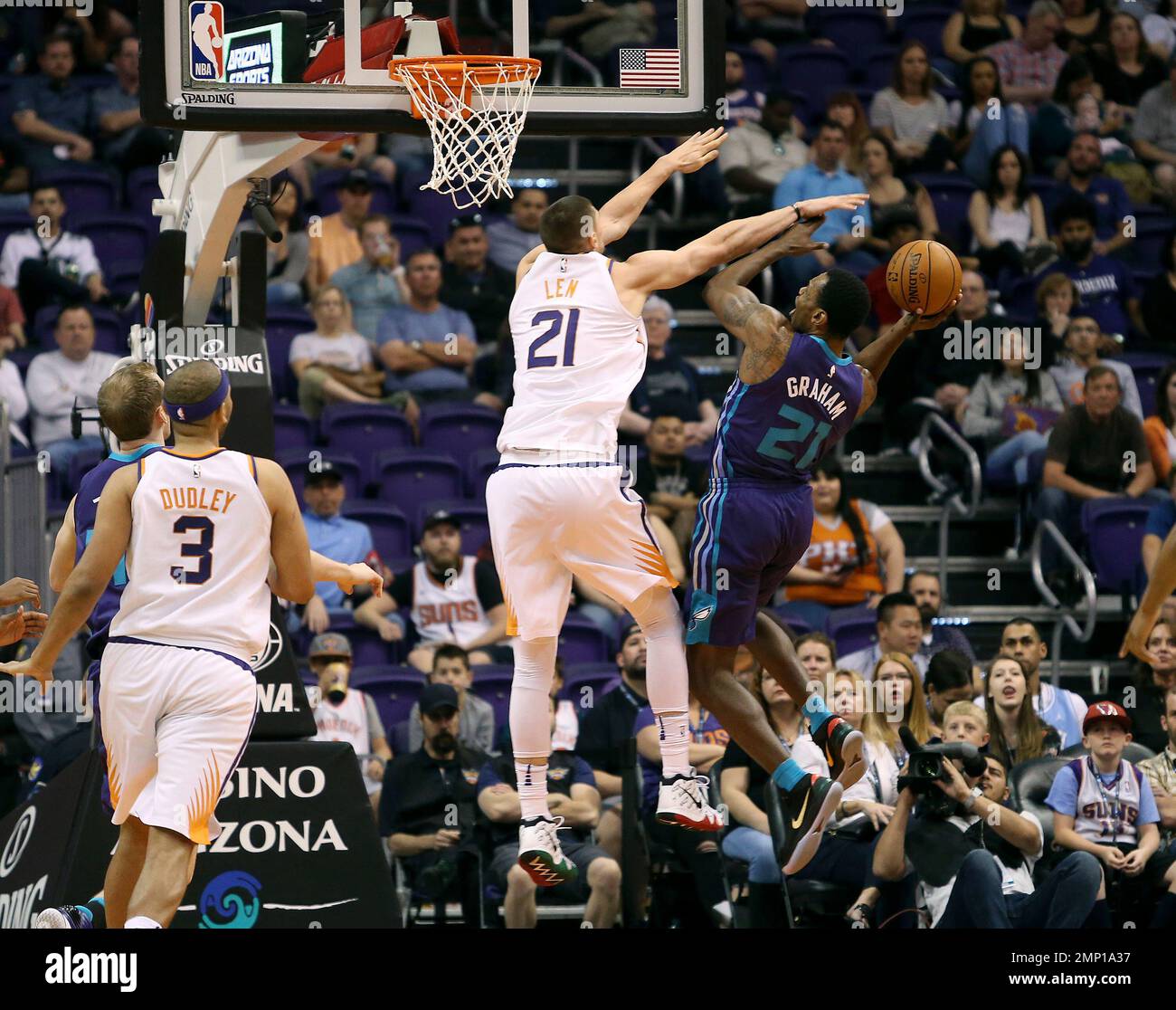 Charlotte Hornets forward Treveon Graham (21) attempts to shoot the ...