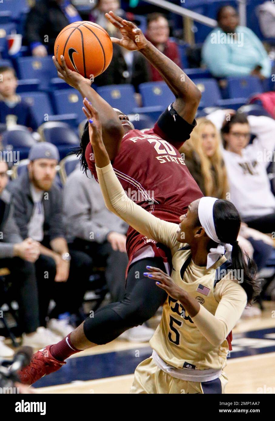 Florida State's Shakayla Thomas (20) shoots over Pittsburgh's Kauai ...