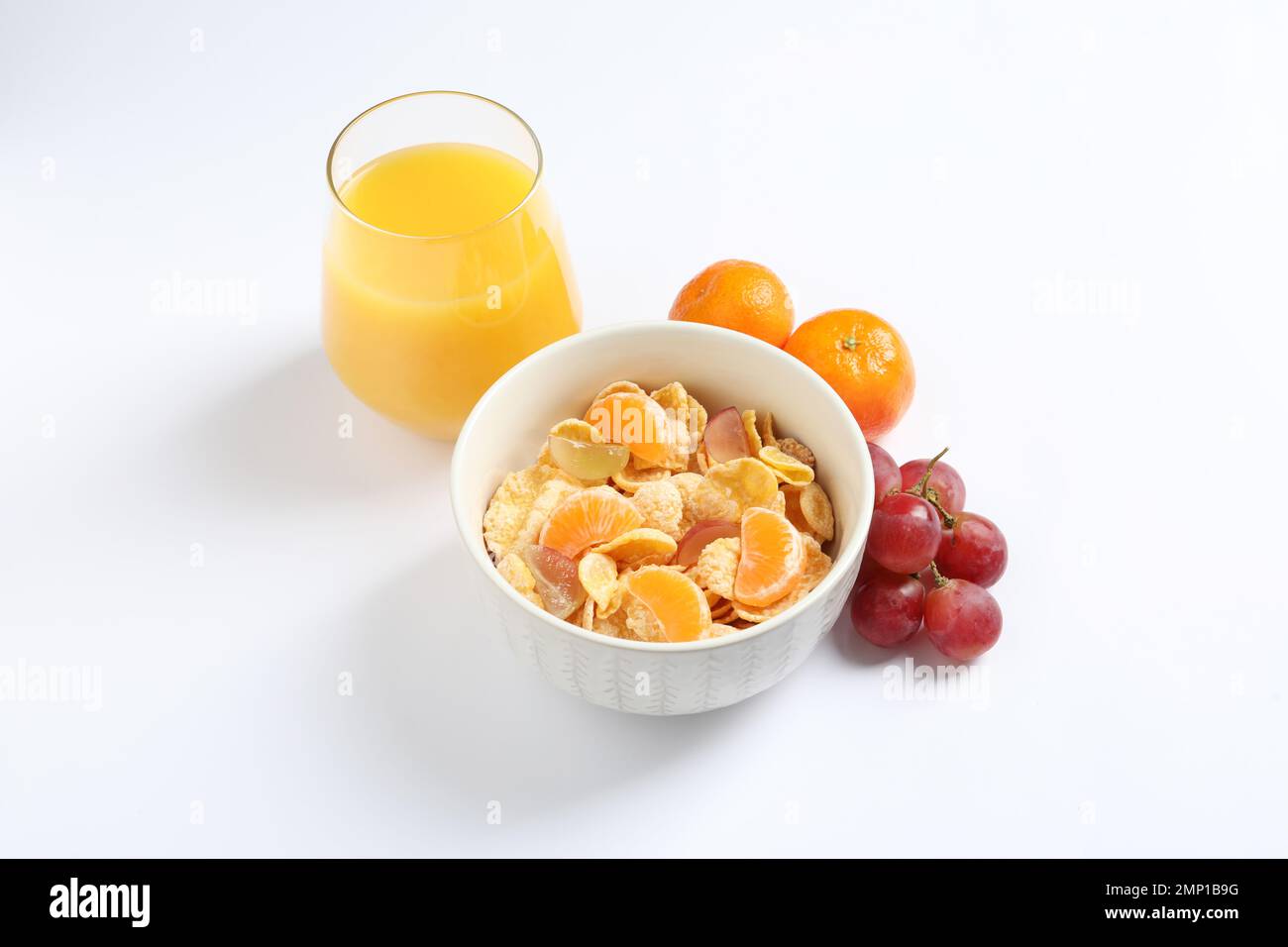 Healthy breakfast and juice on white background Stock Photo - Alamy