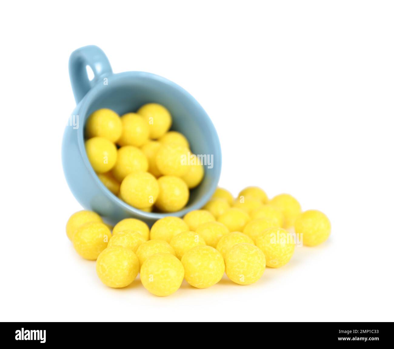 Tasty small lemon drops on white background Stock Photo - Alamy