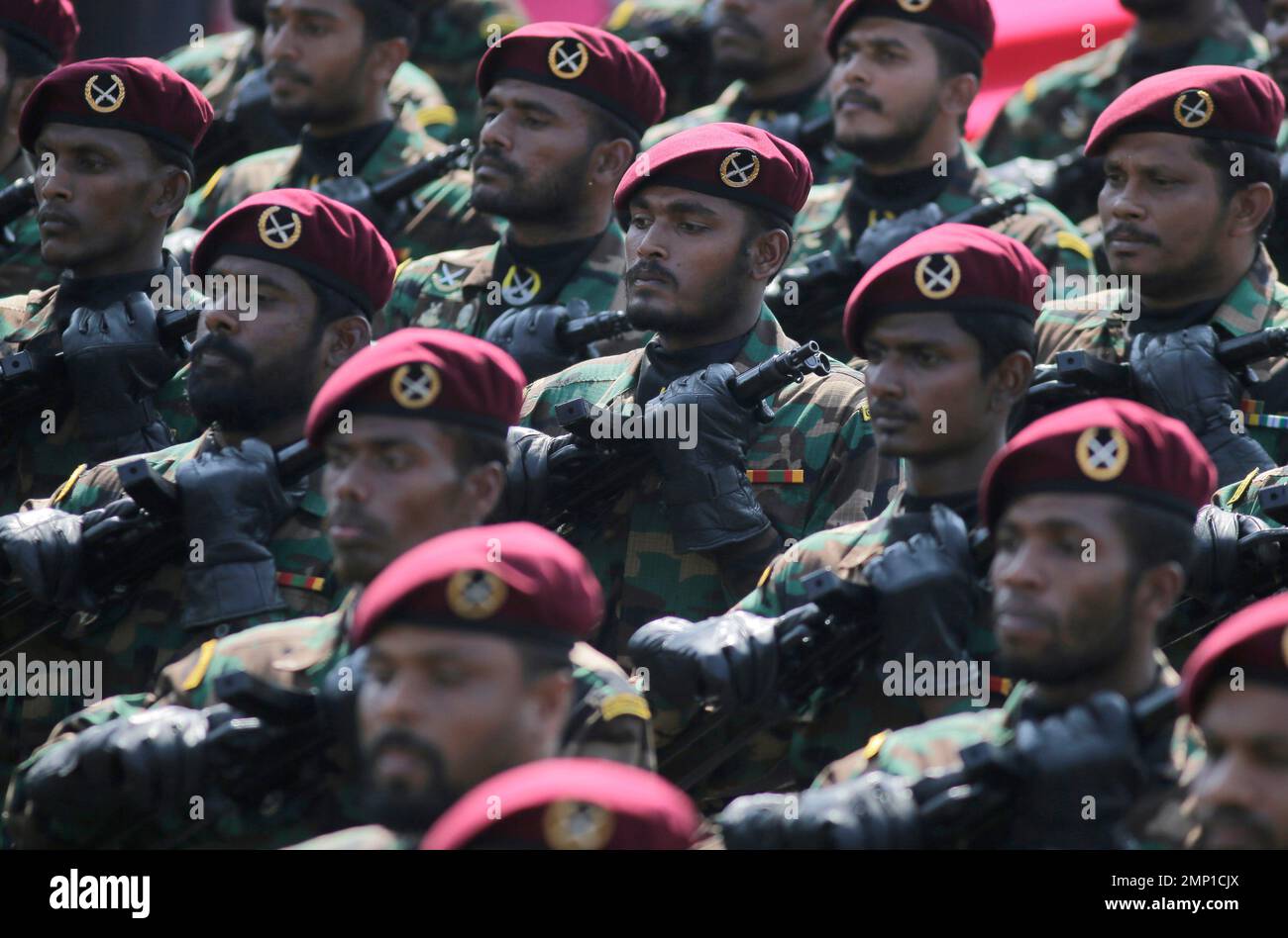 Sri Lankan army soldiers march during the 70th Independence Day parade ...