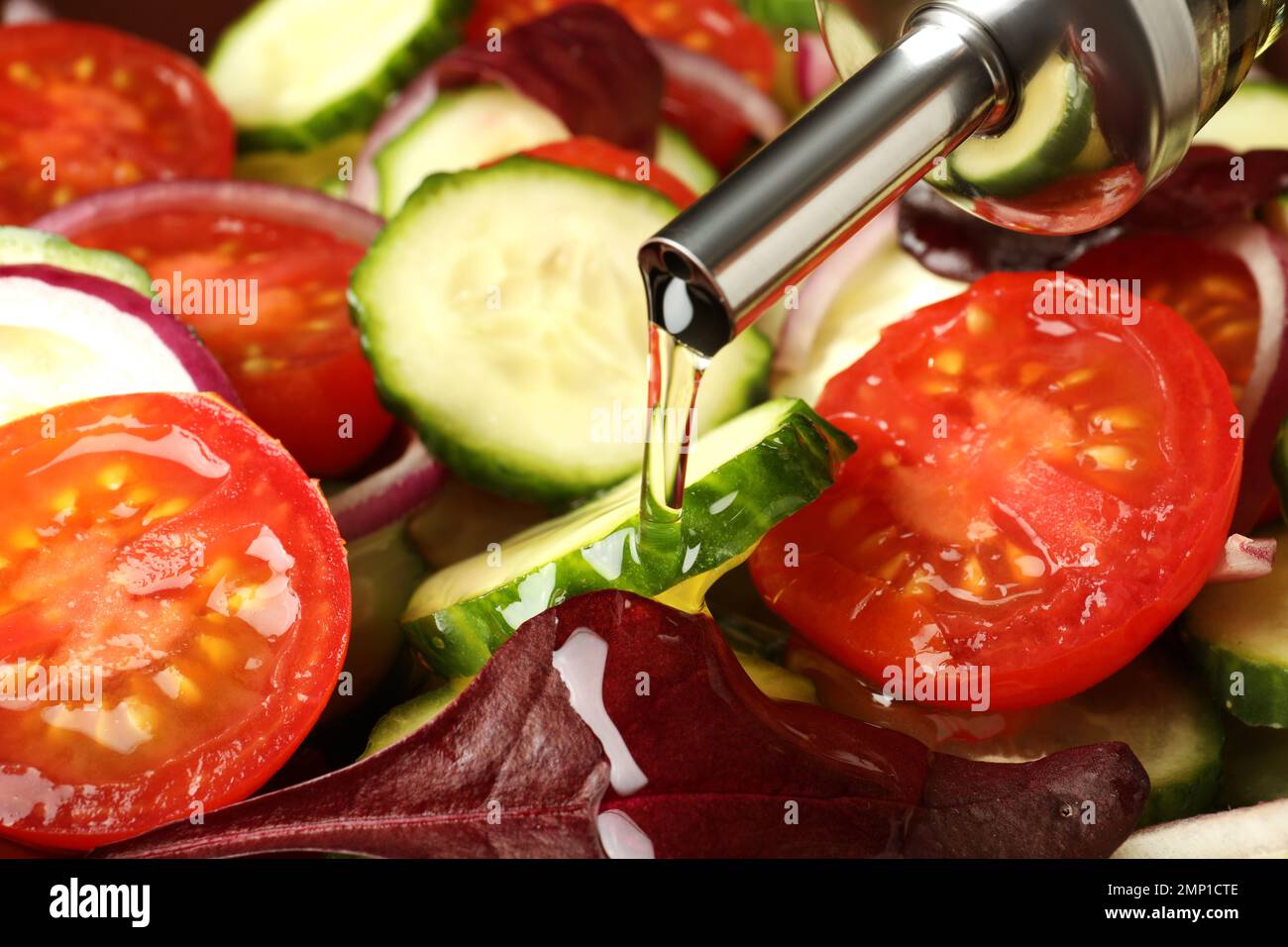 Adding salad dressing hi-res stock photography and images - Alamy