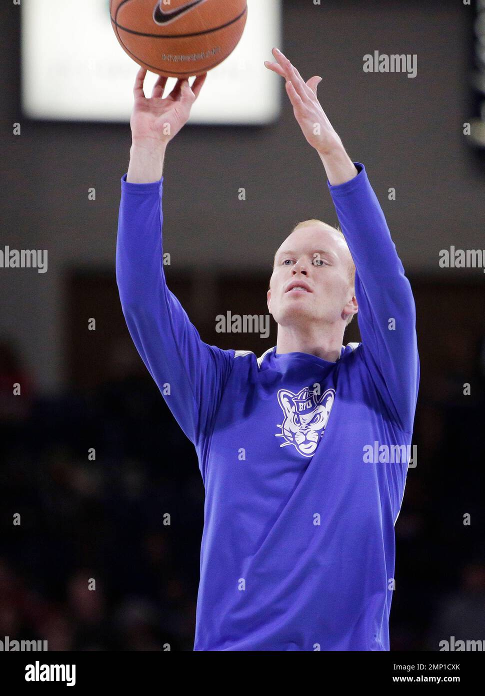 BYU guard TJ Haws shoots during warmups before an NCAA college ...