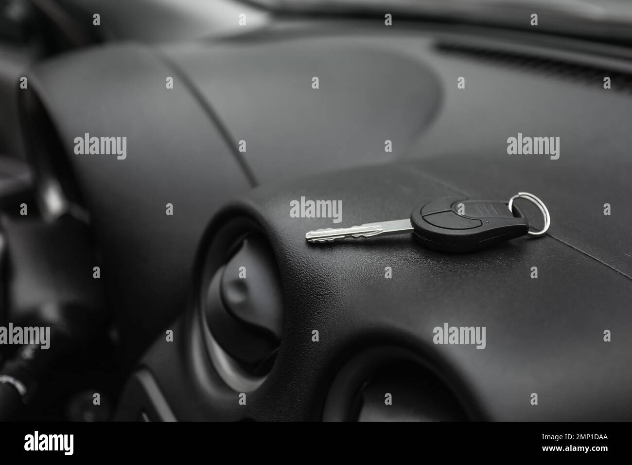 Key in new modern automobile. Car buying Stock Photo - Alamy