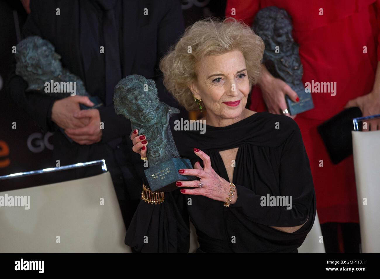Spanish actress Marisa Paredes poses with her trophy after winning a ...