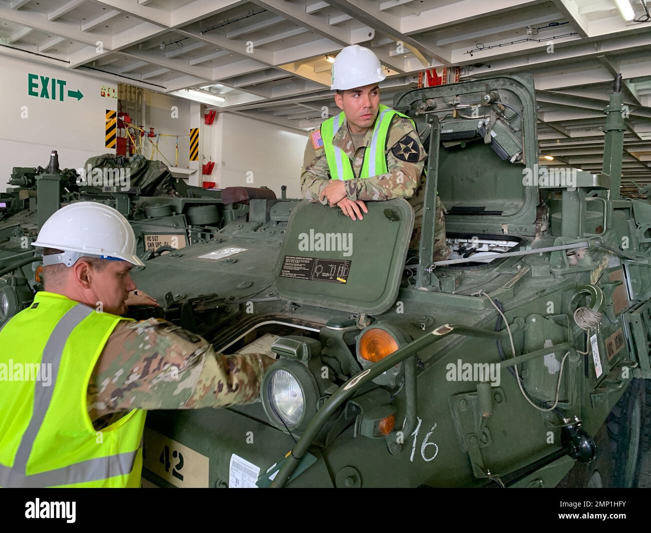 Soldiers assigned to the 2nd Infantry Division prepare to offload ...