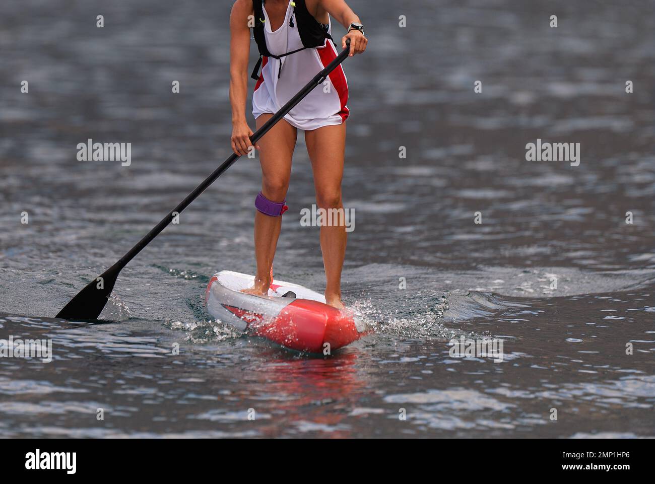 Woman paddle boarding ocean hi-res stock photography and images - Alamy