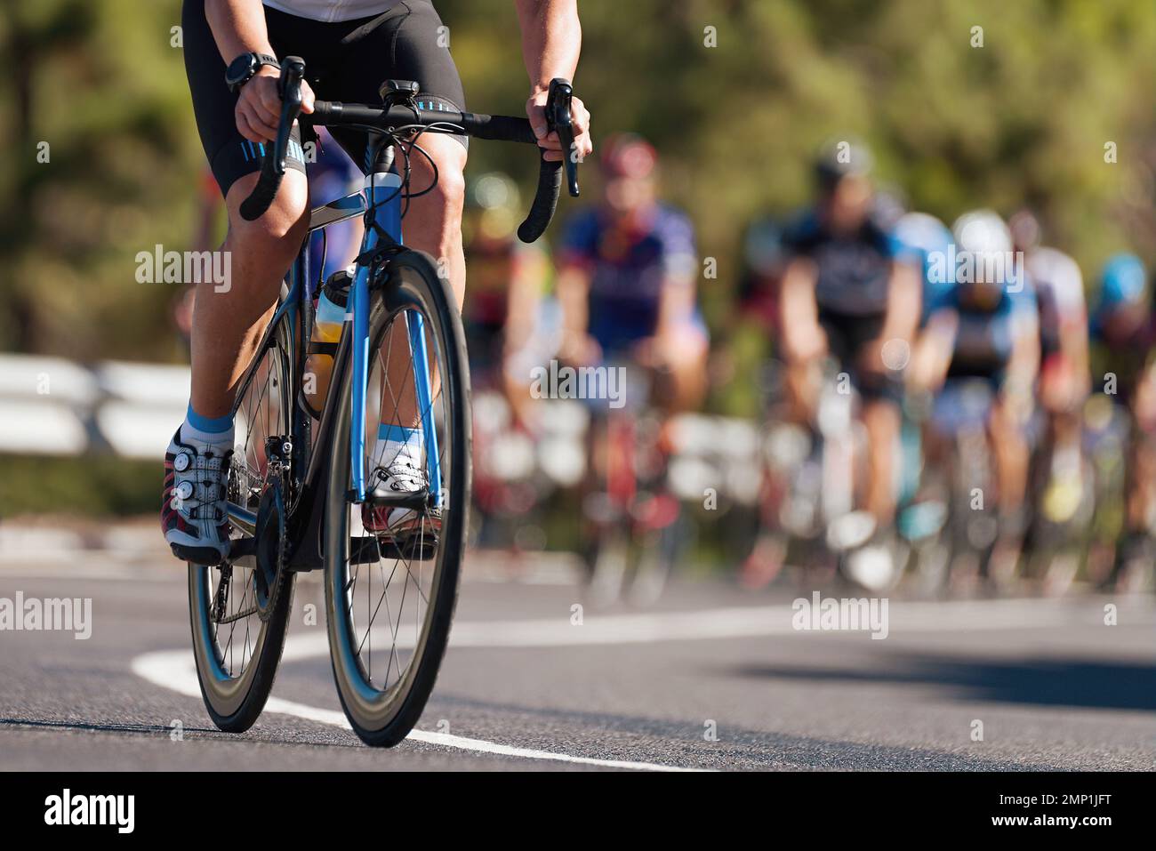 Group of cyclist at professional race, cyclists in a road race stage ...