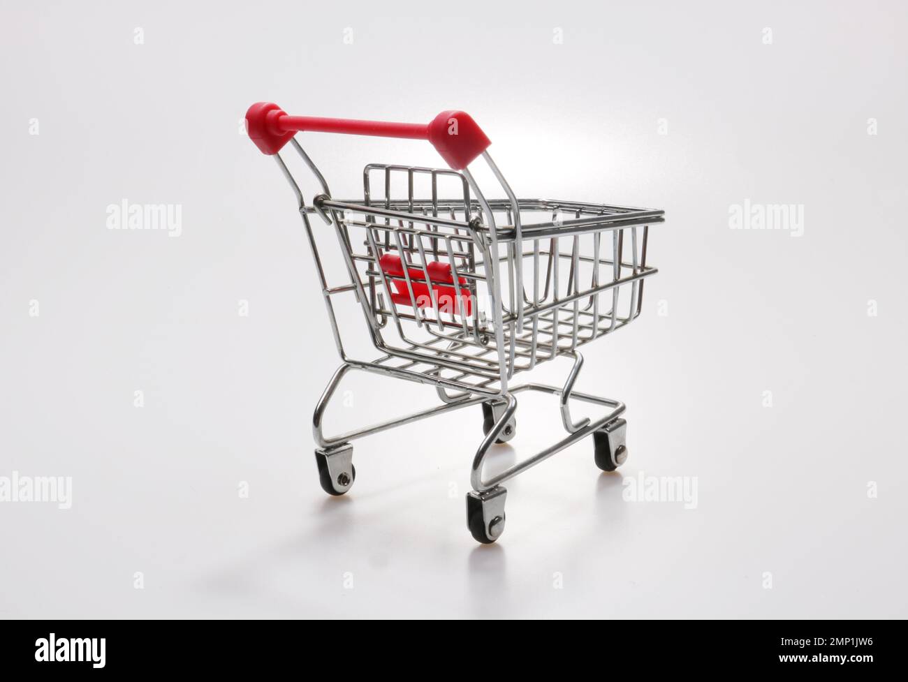 Red supermarket cart, Trolley. isolated on white background Stock Photo ...
