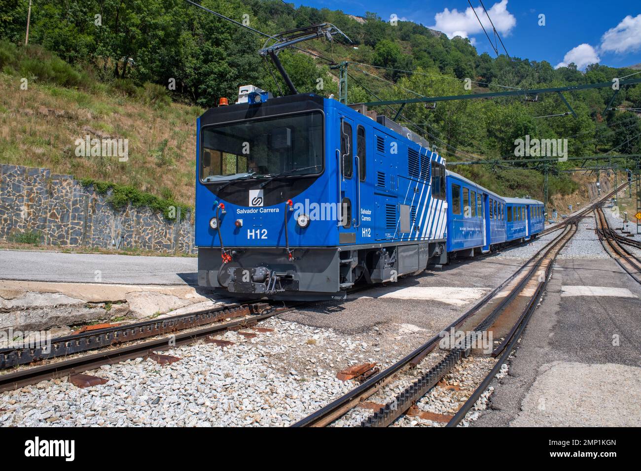 Queralbs station and engine of the Cogwheel railway Cremallera de Núria ...