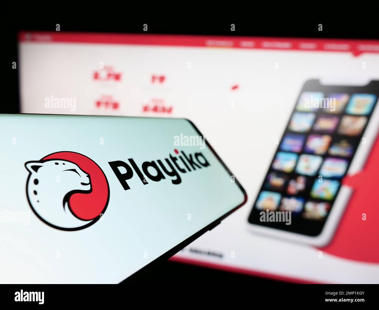 Mobile phone with logo of Israeli mobile games company Playtika Ltd. on ...