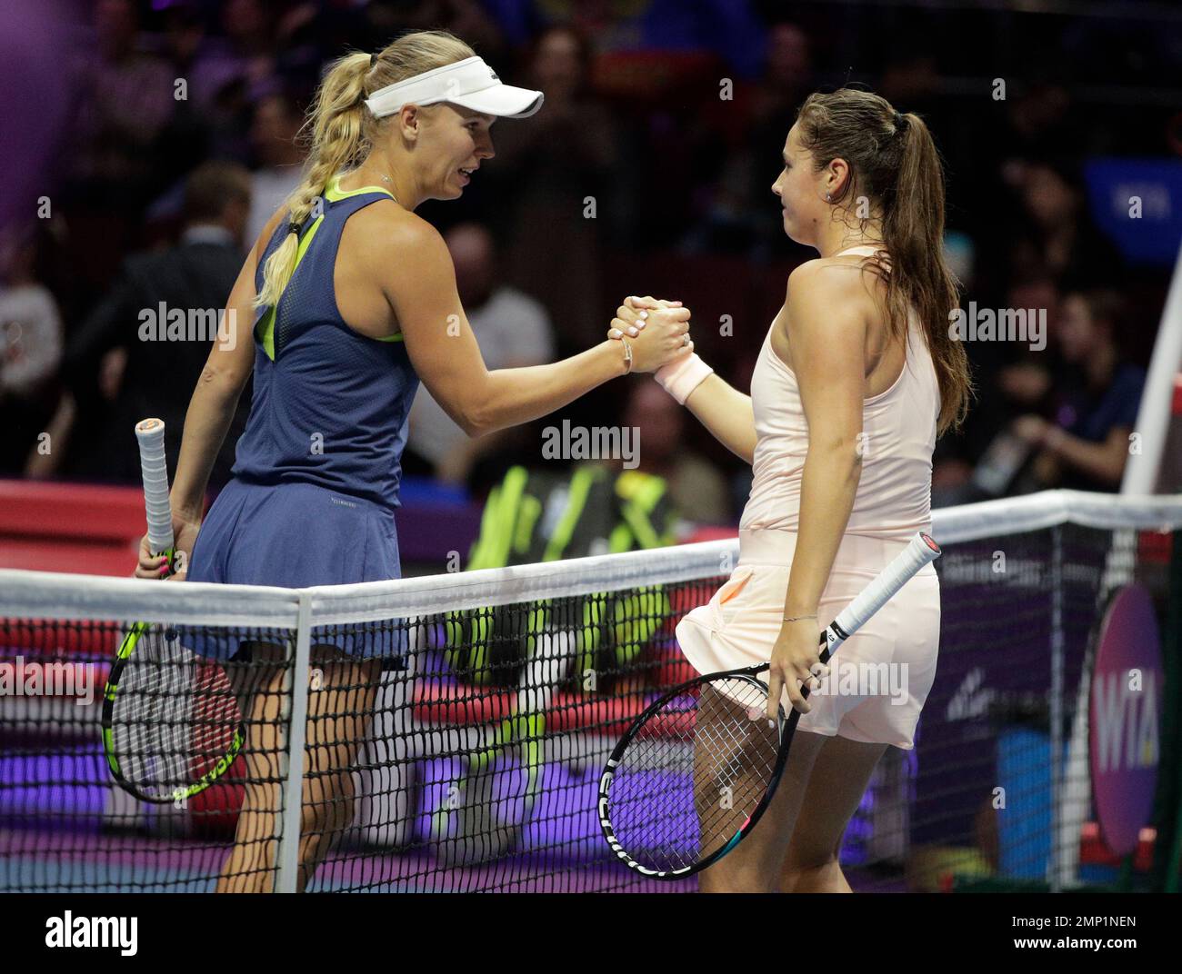 Caroline Wozniacki of Denmark and Daria Kasatkina of Russia shake hands ...