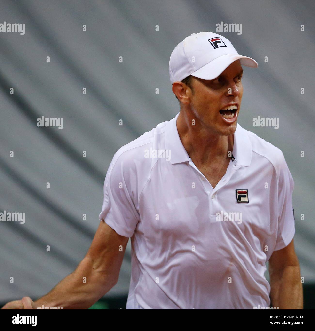 United States' Sam Querrey celebrates after defeating Serbia's Laslo ...