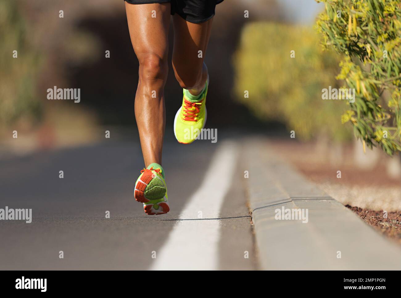 Man running on street asphalt hi-res stock photography and images - Alamy
