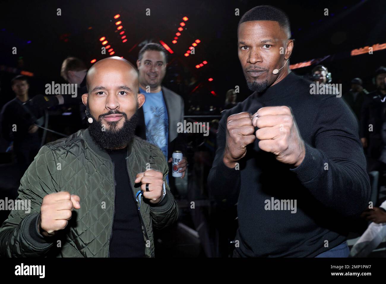 UFC fighter Demetrious "Mighty Mouse" Johnson, left, and Jamie Foxx ...