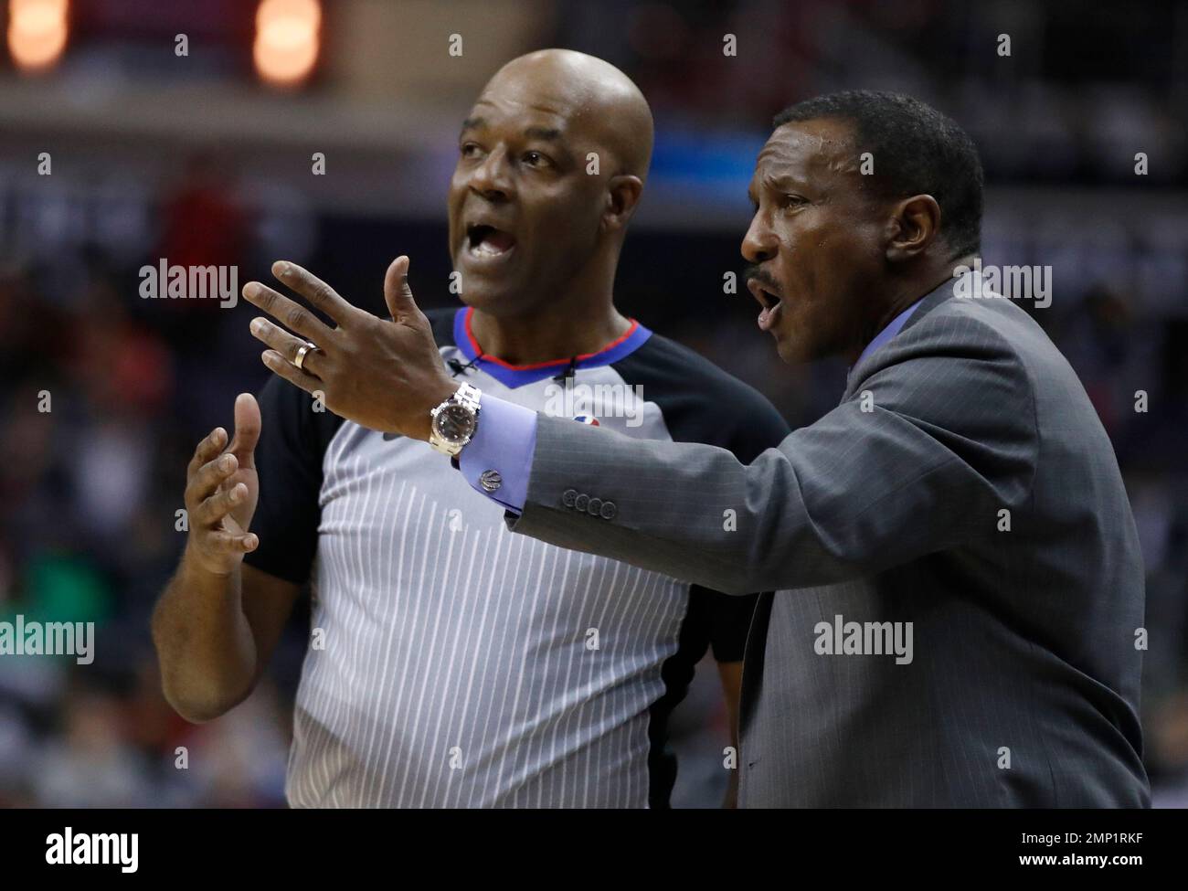 Referee Haywoode Workman, left, and Toronto Raptors head coach Dwane ...