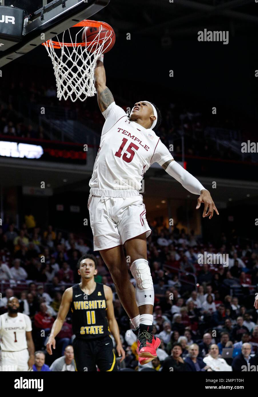 Temple's Nate Pierre-Louis goes up for the dunk during the second half ...
