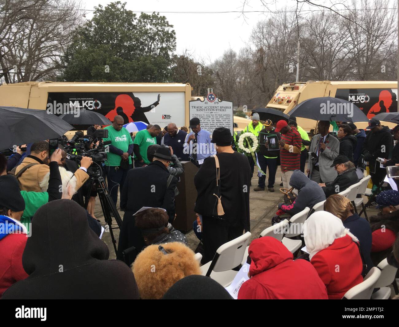 Memphis sanitation worker Cleophus Smith (center, at podium) leads a ...
