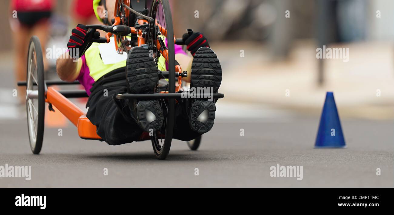 Disabled athlete in a sport wheelchair during marathon Stock Photo - Alamy