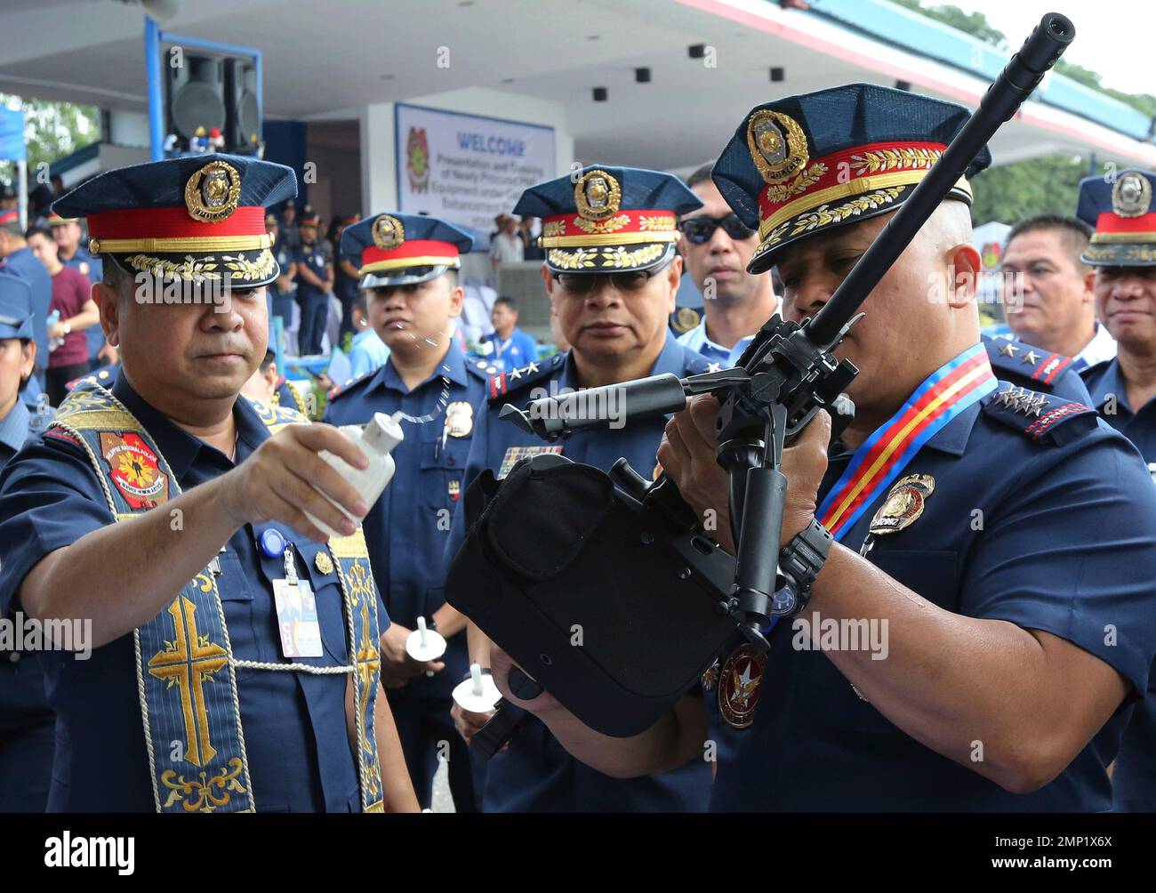 Philippine National Police Chief Director Gen. Ronald Dela Rosa, right ...