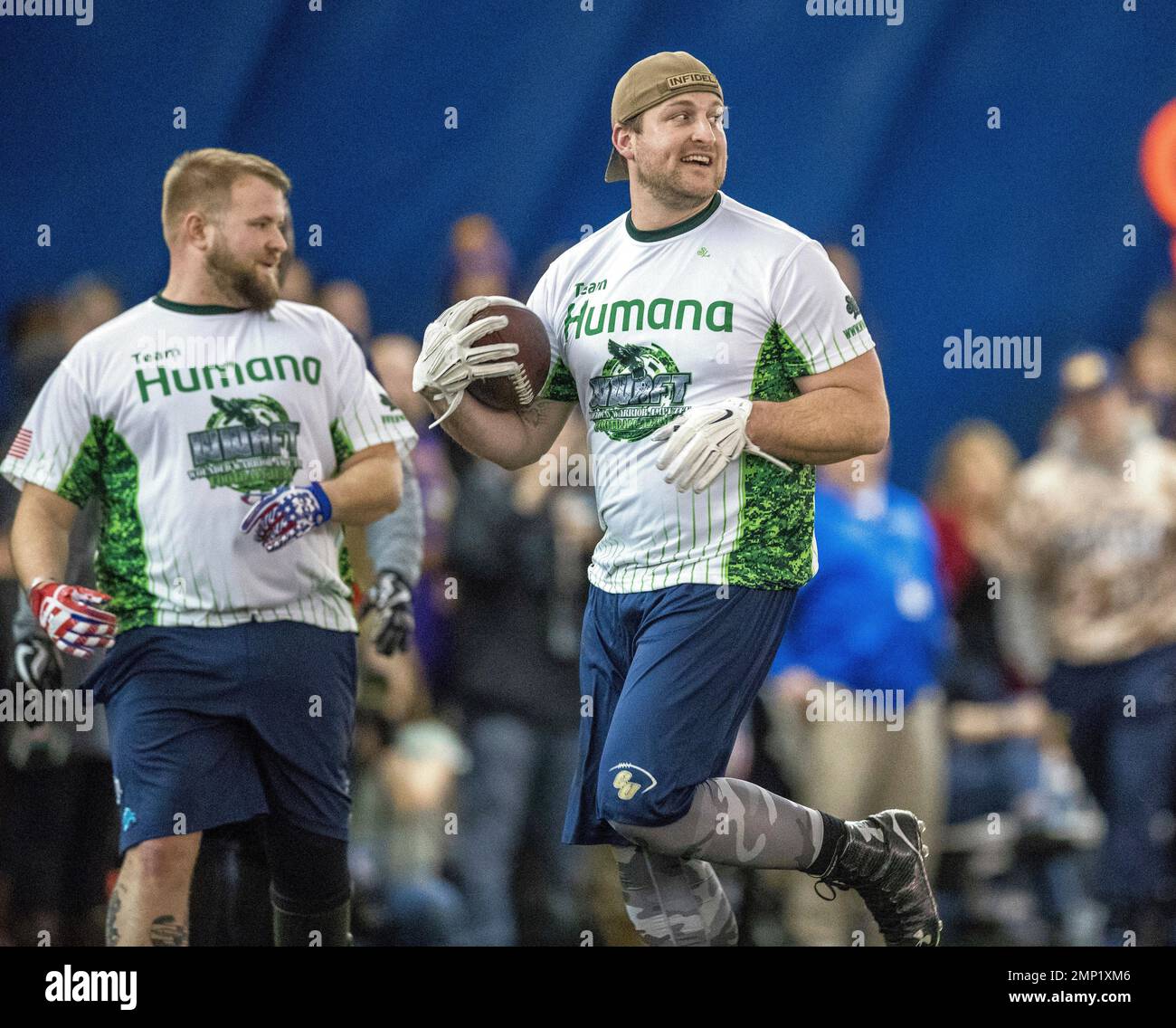 IMAGE DISTRIBUTED FOR HUMANA - Veteran Marine Hank Goff, right, runs ...