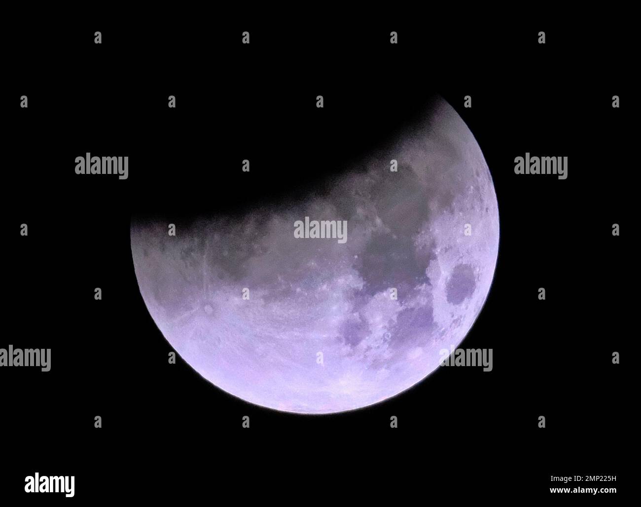 The shadow of the earth passes through the moon during a total lunar ...
