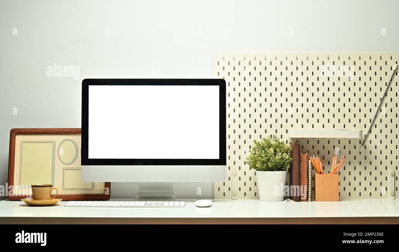 Front view of white blank screen computer monitor, picture frame ...