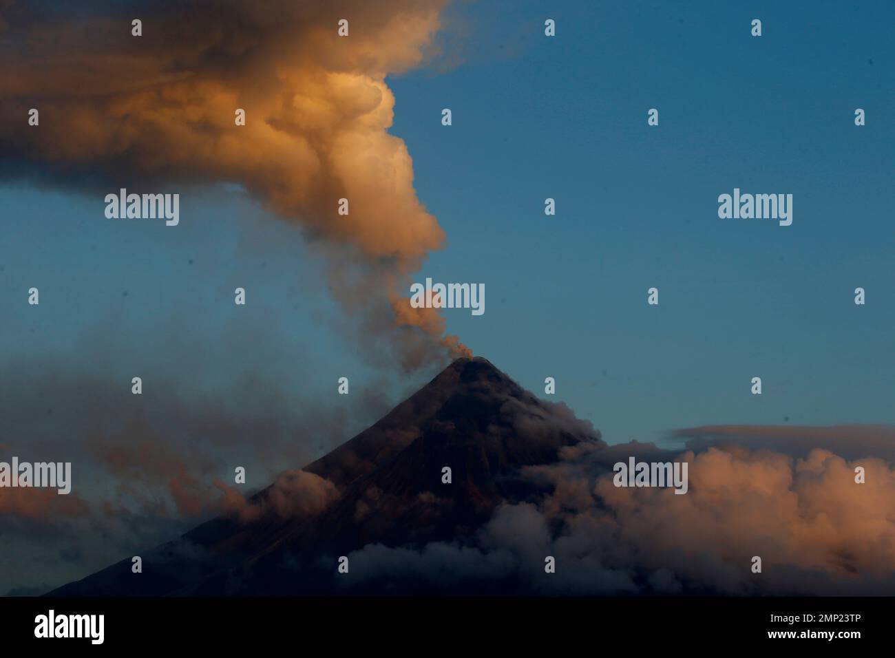Mayon volcano spews ash anew during its mild eruption as seen in ...