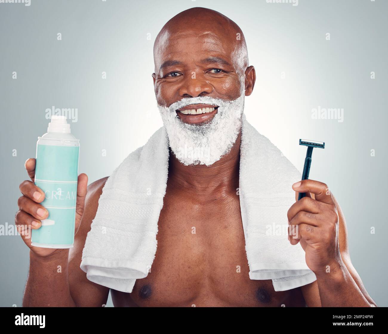 Black man, beard and shaving with razor, cream or cosmetics for skincare, grooming or self care ...
