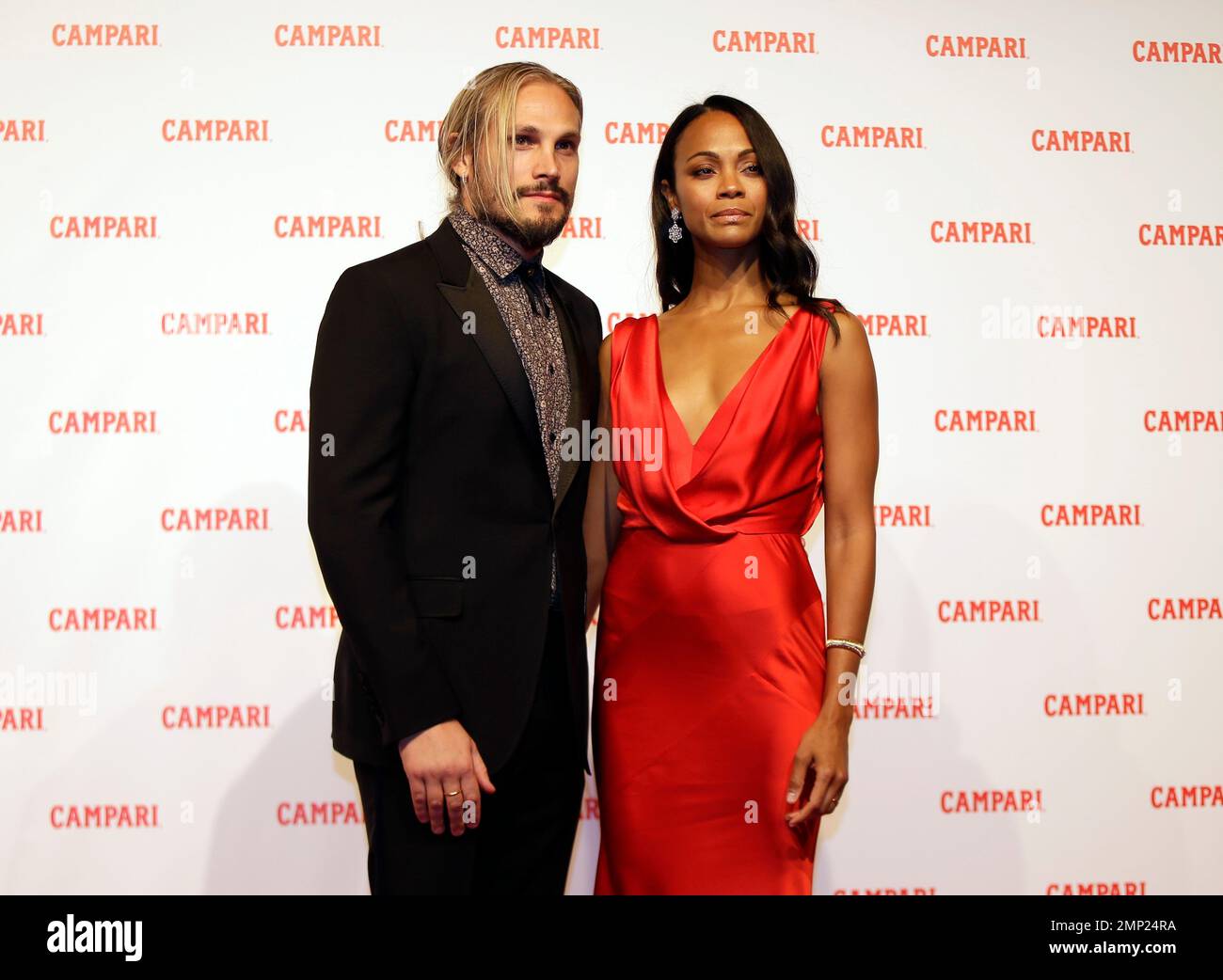 Actress Zoe Saldana poses with her husband Marco Perego during a photo ...