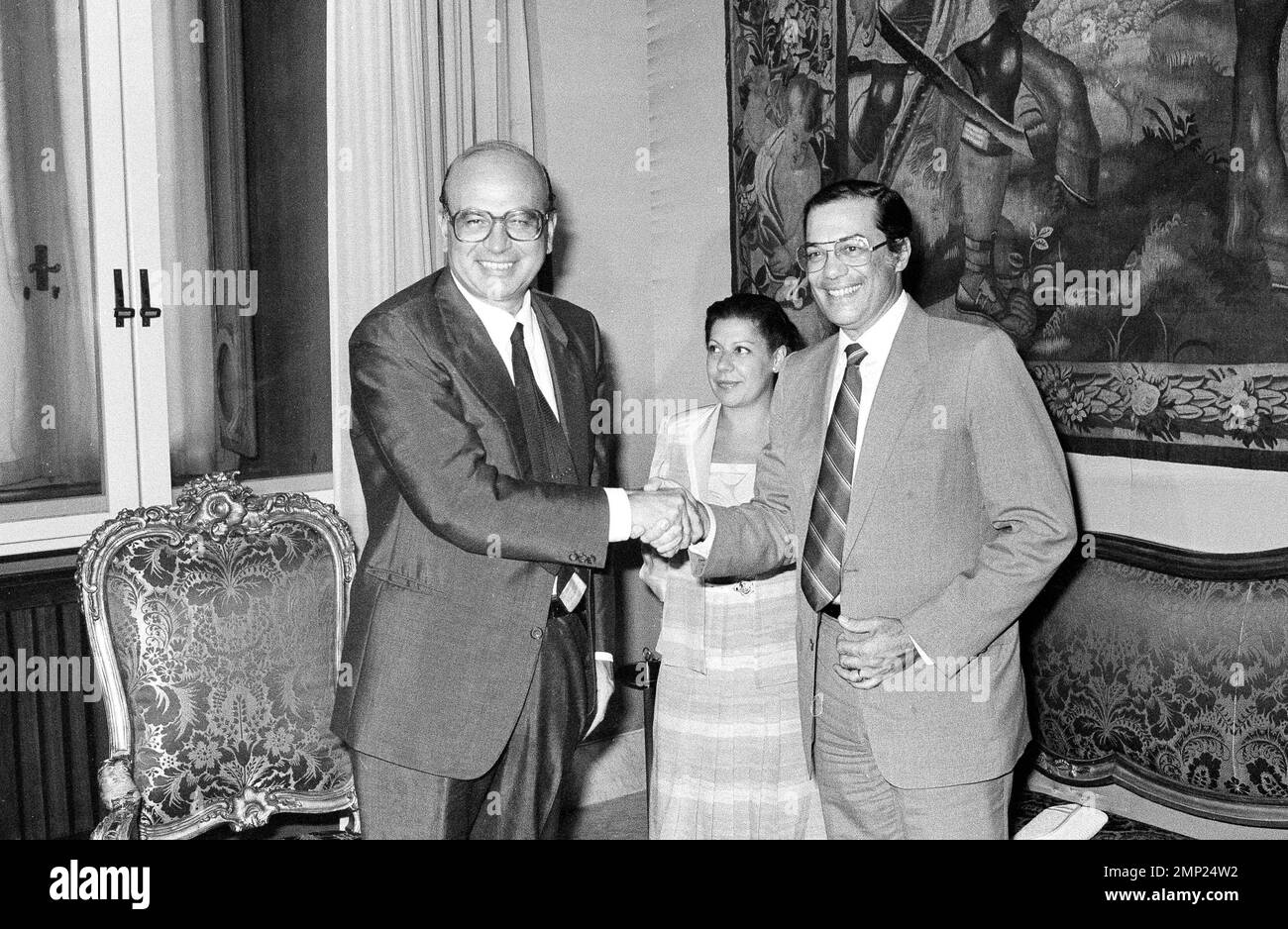 Panama's President-elect Nicolas Ardito Barletta, right, shakes hands ...