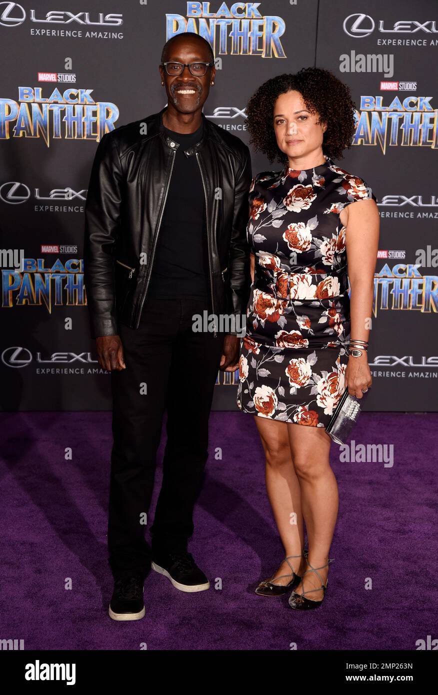 Actor Don Cheadle and his wife Bridgid Coulter pose together at the ...