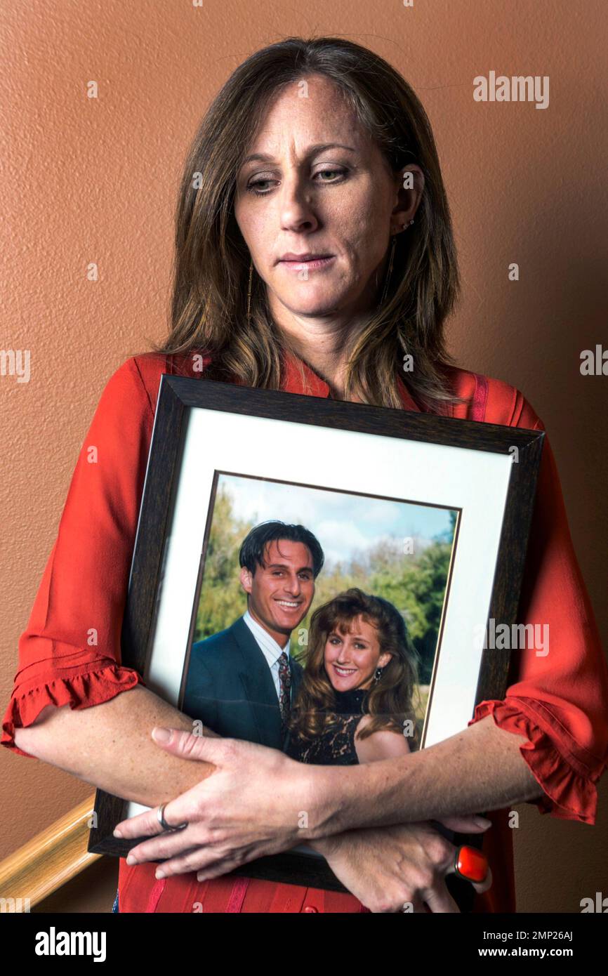 FILE - In this May, 15, 2014, file photo, Kim Goldman holds a photo of ...