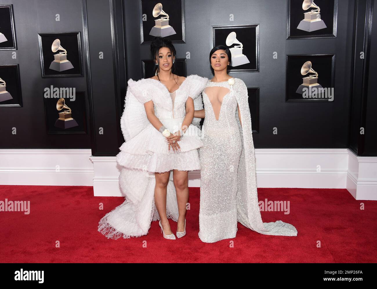 Cardi B, left, and sister Hennessy Carolina arrive at the 60th annual ...