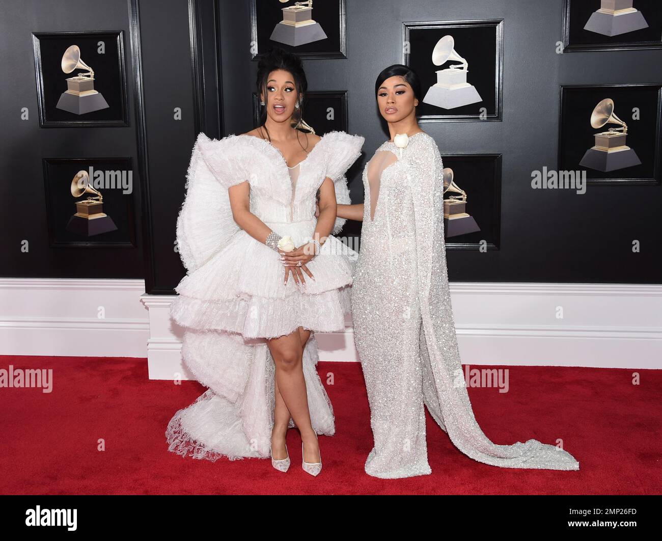 Cardi B, left, and sister Hennessy Carolina arrive at the 60th annual ...