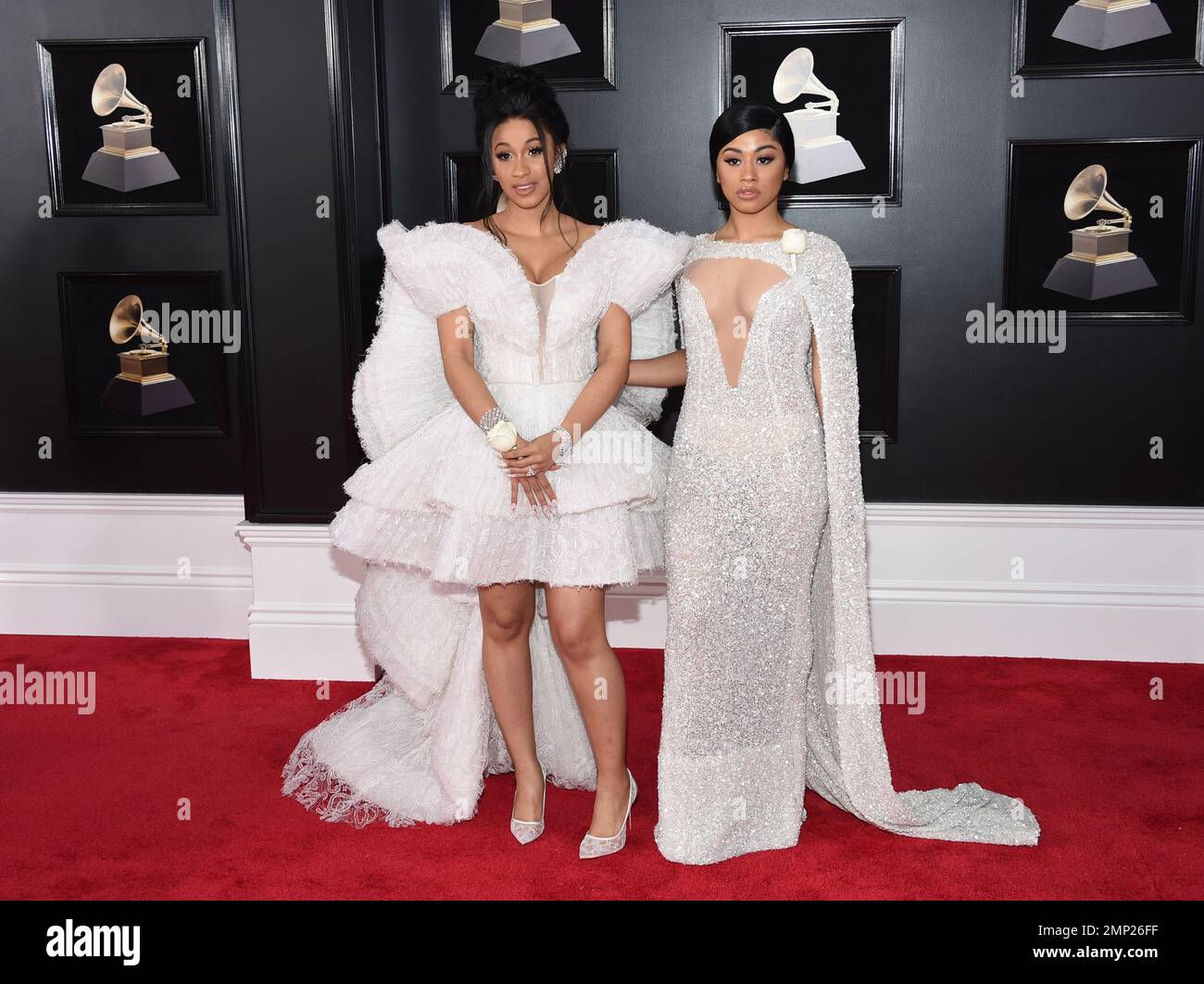 Cardi B, left, and sister Hennessy Carolina arrive at the 60th annual ...