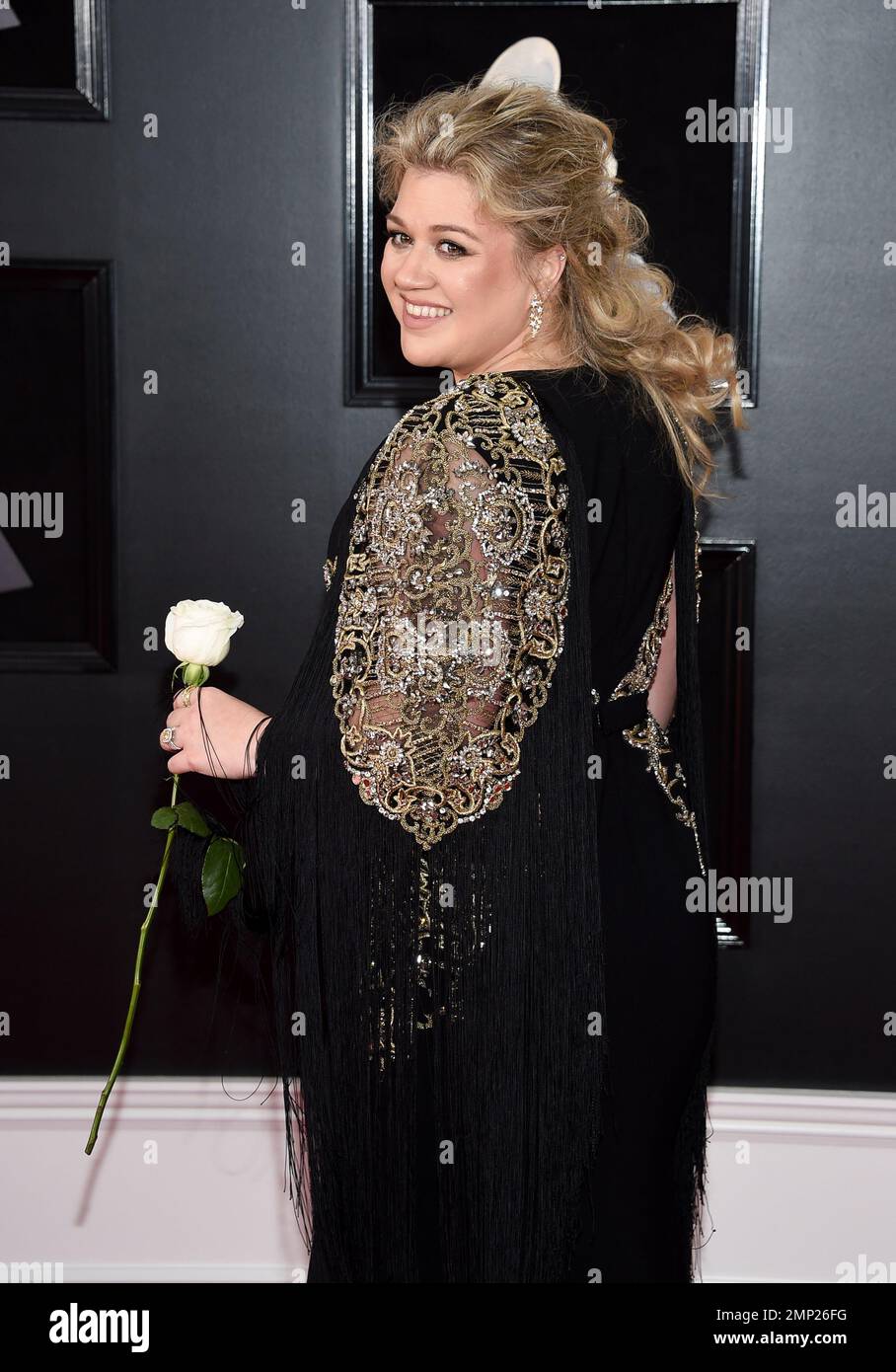 Kelly Clarkson arrives at the 60th annual Grammy Awards at Madison ...