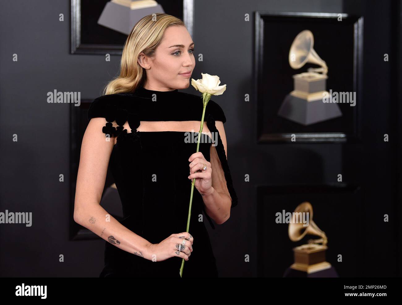 Miley Cyrus arrives at the 60th annual Grammy Awards at Madison Square ...