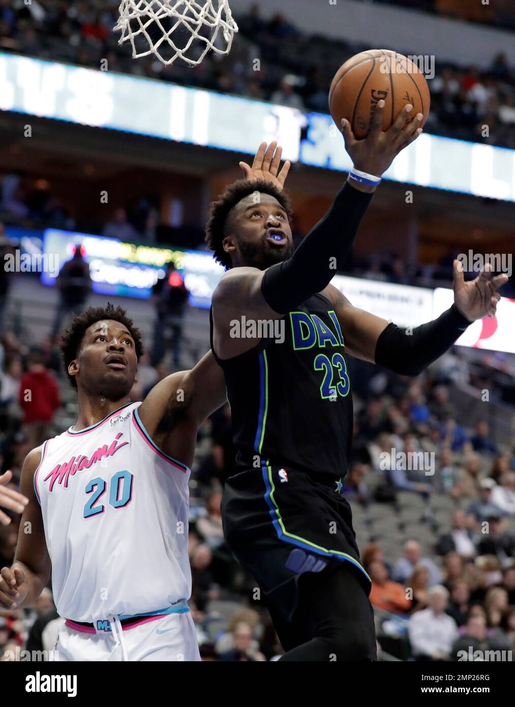 Dallas Mavericks guard Wesley Matthews (23) goes up for a shot after ...