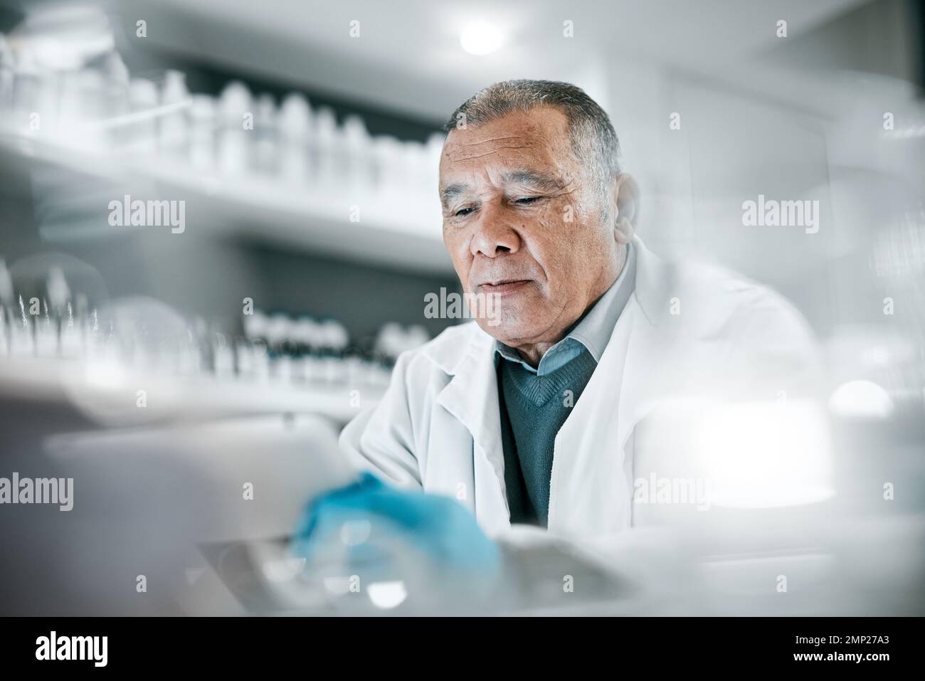 Science, research and senior man scientist working on experiment, tests ...