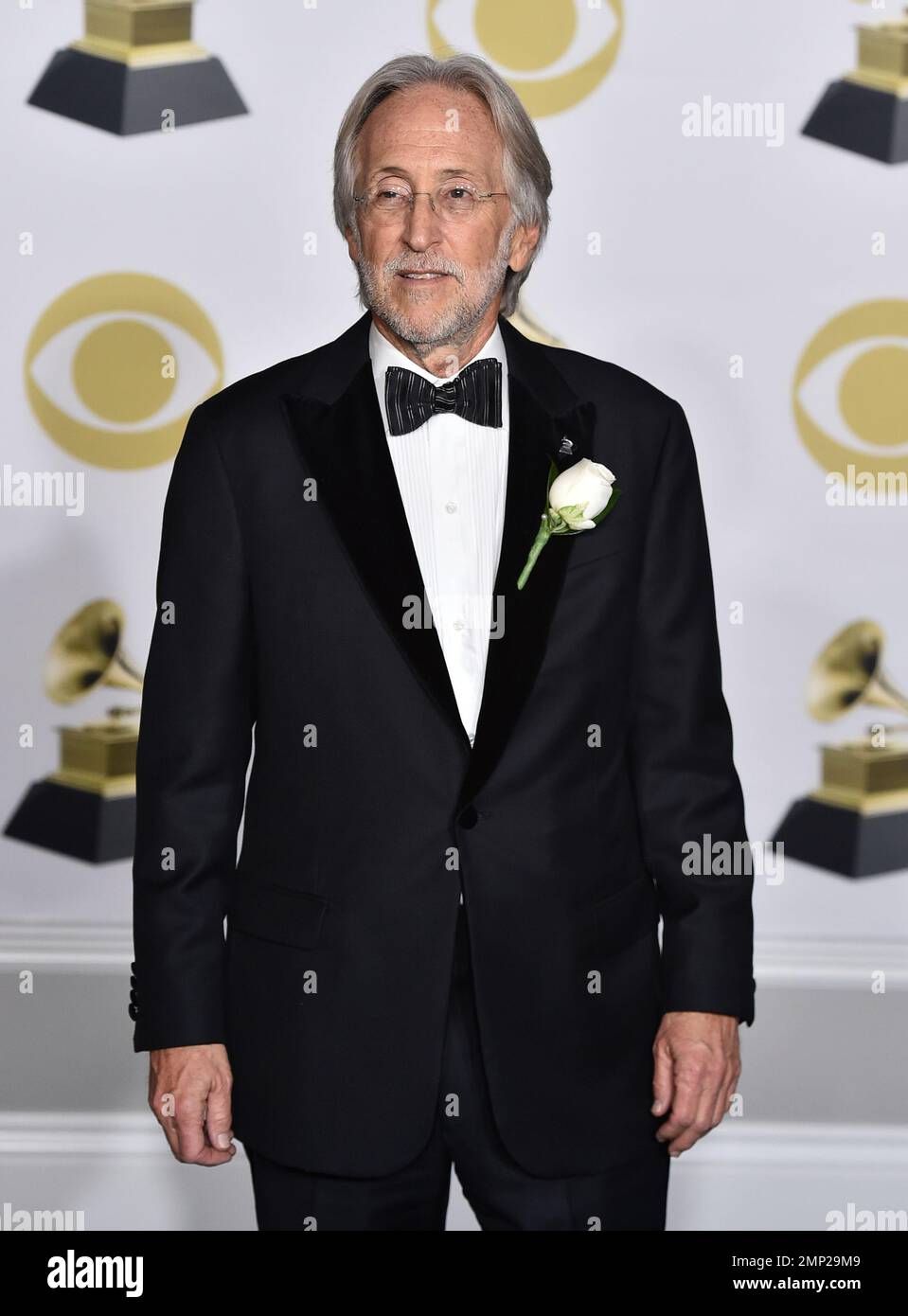 President of The Recording Academy Neil Portnow poses in the press room ...