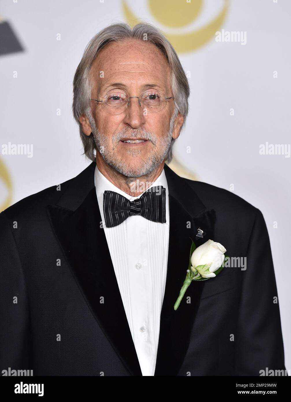 President of The Recording Academy Neil Portnow poses in the press room ...