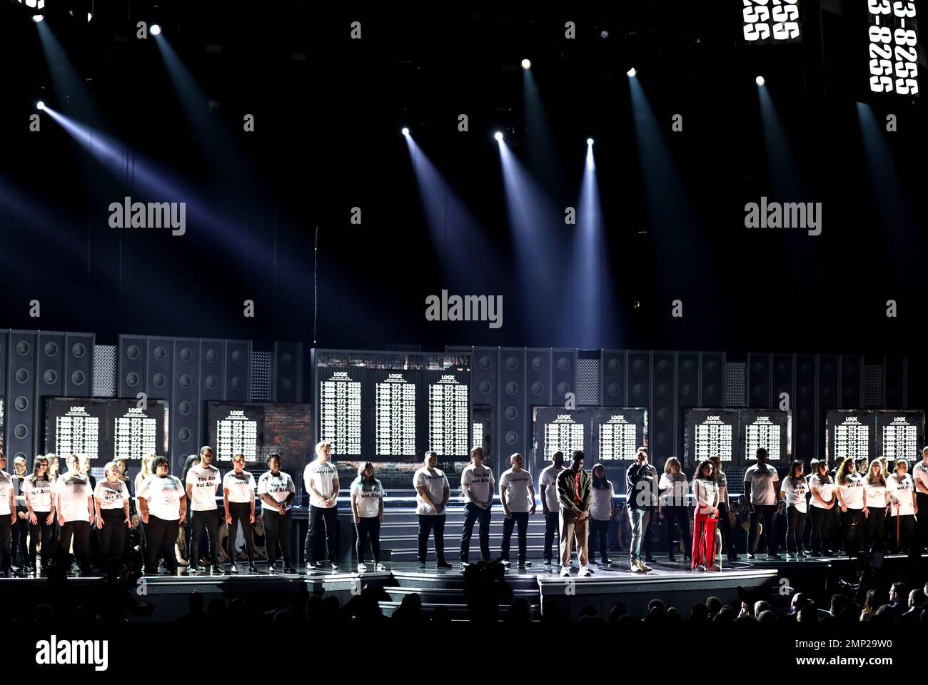 Khalid, foreground from left, Logic, and Alessia Cara perform "1-800 ...