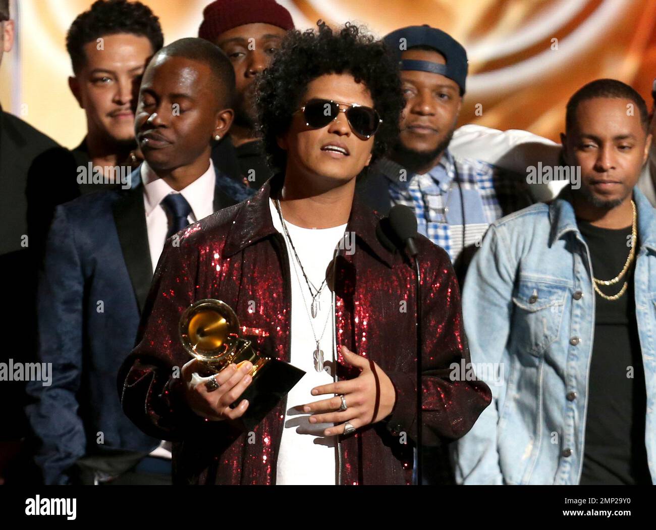 Bruno Mars accepts the award for album of the year for "24K Magic" at ...