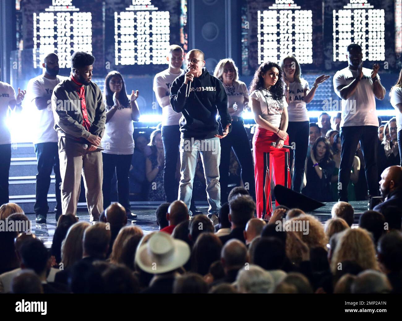 Khalid, from left, Logic, and Alessia Cara perform "1-800-273-8255" as ...