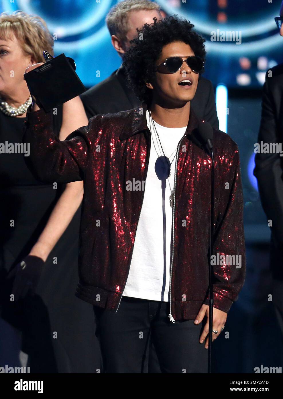 Bruno Mars accepts the award for record of the year for "24K Magic" at ...