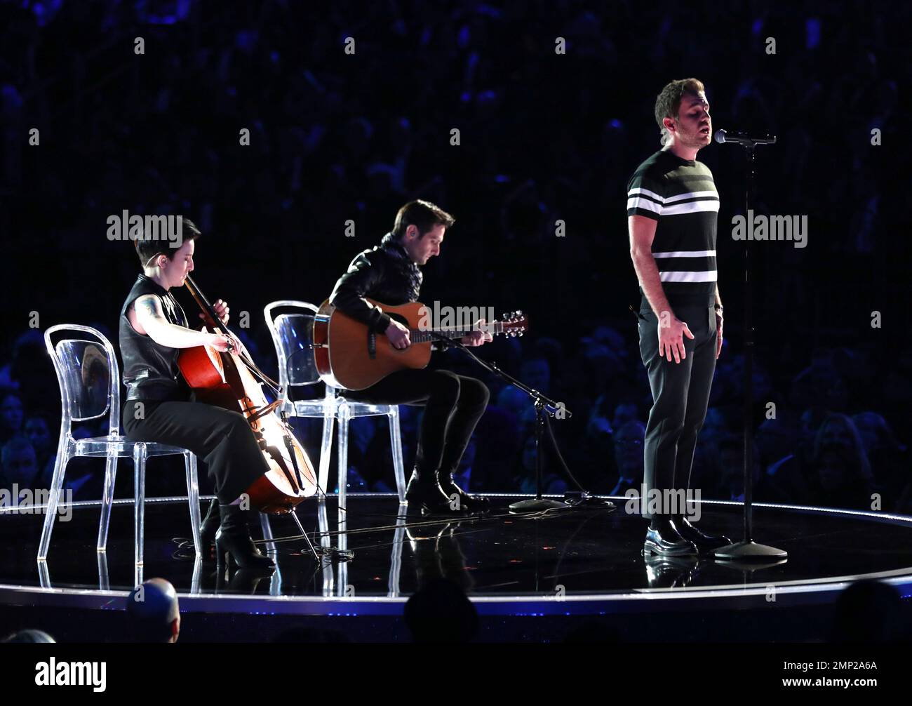Ben Platt, right, performs "Somewhere" during a tribute to Leonard ...
