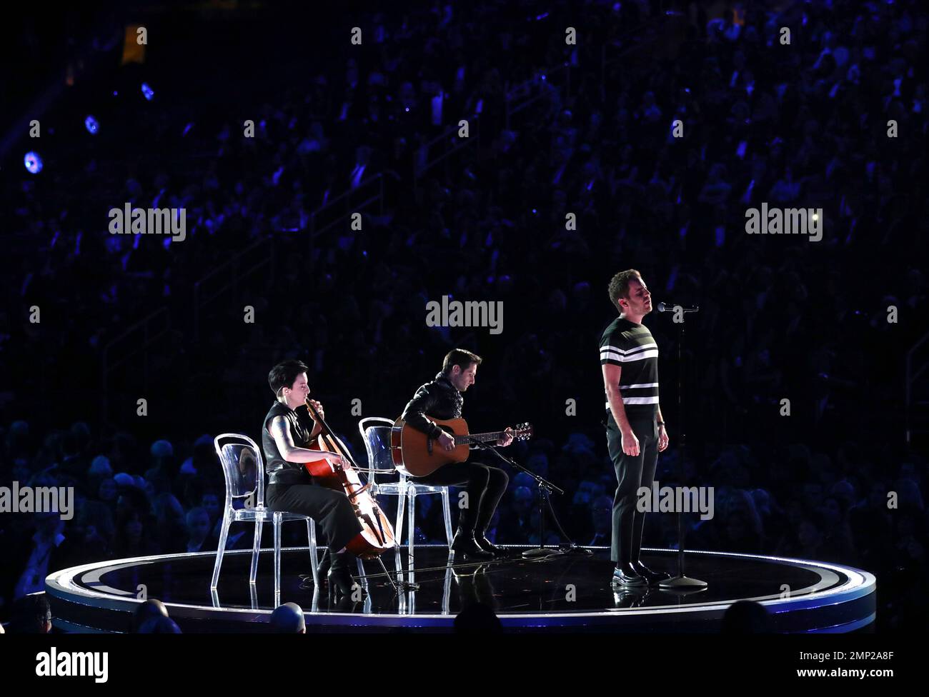 Ben Platt, right, performs "Somewhere" during a tribute to Leonard ...